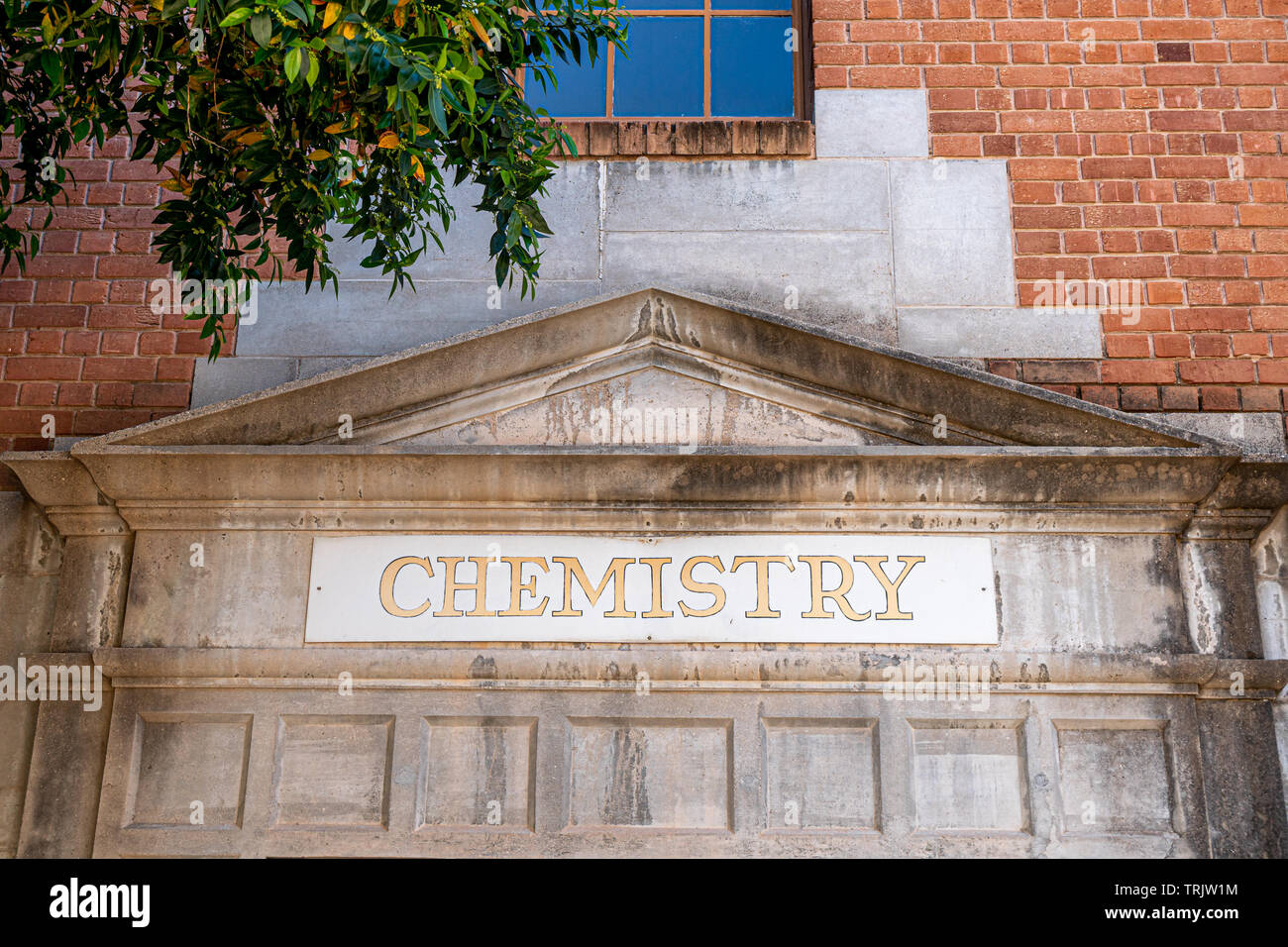 Weathered vintage chemistry sign on building in American university ...