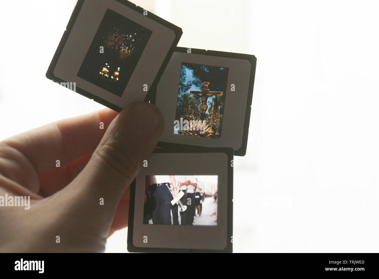 Viewing 35mm slides on a light box Stock Photo - Alamy