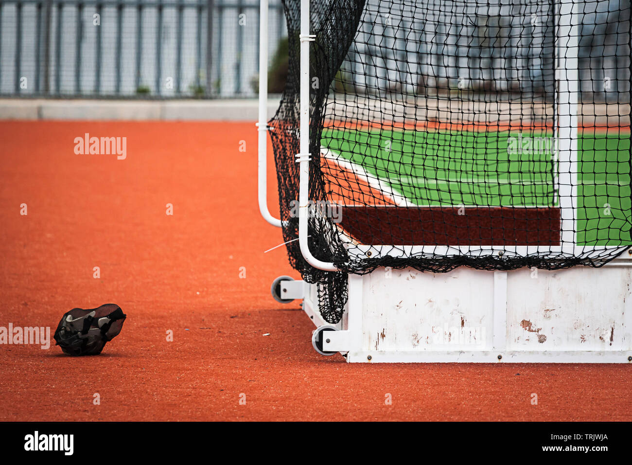 Goal box on astro hockey field with helmet in view Stock Photo - Alamy