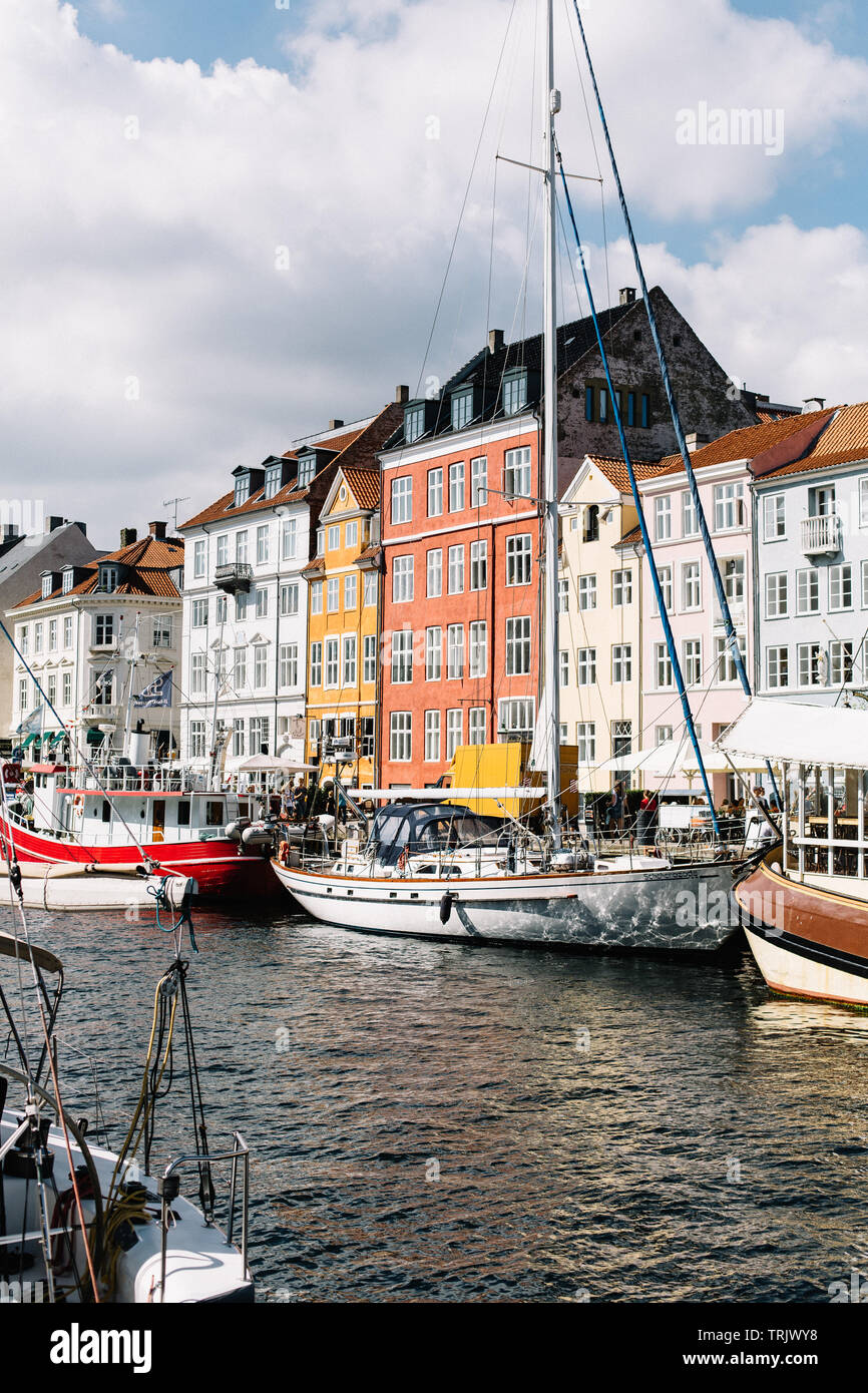 Row of traditional, colorful Danish buildings along the canal in ...
