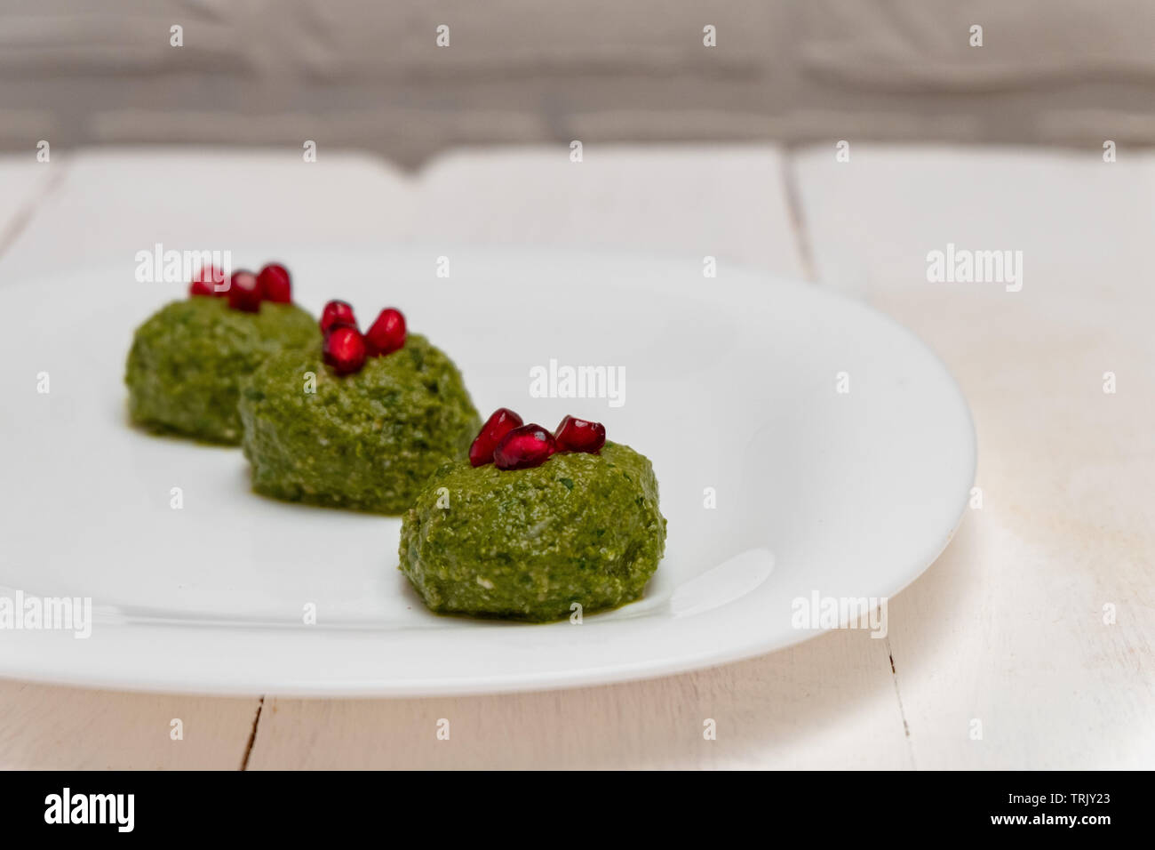 Spinach Pkhali on white wooden background, selective focus Stock Photo ...