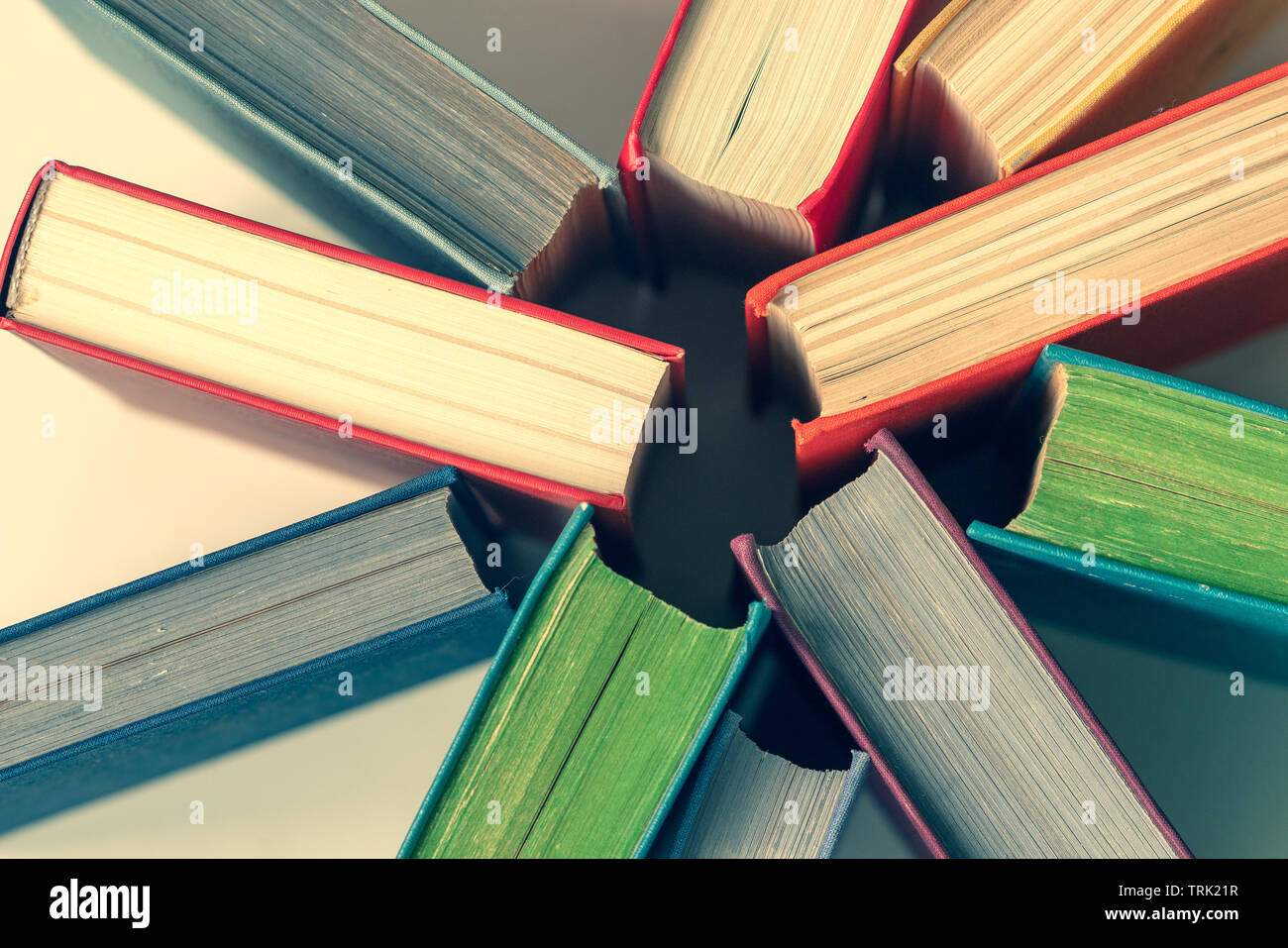 Top view of colorful hardback books in a circle Stock Photo - Alamy