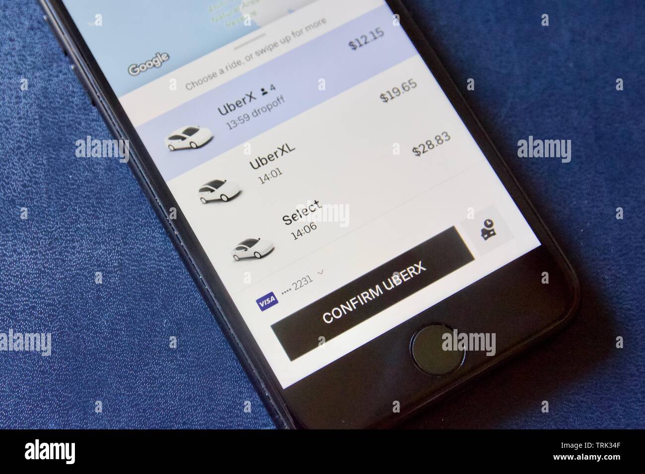 Uber ride type menu on an iPhone Stock Photo - Alamy