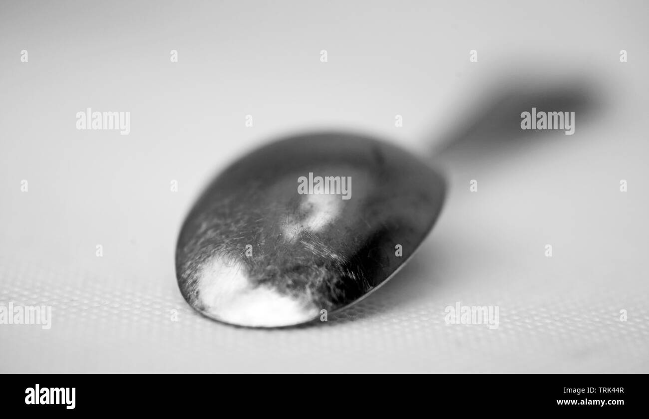 Silver spoon reflections hi-res stock photography and images - Alamy
