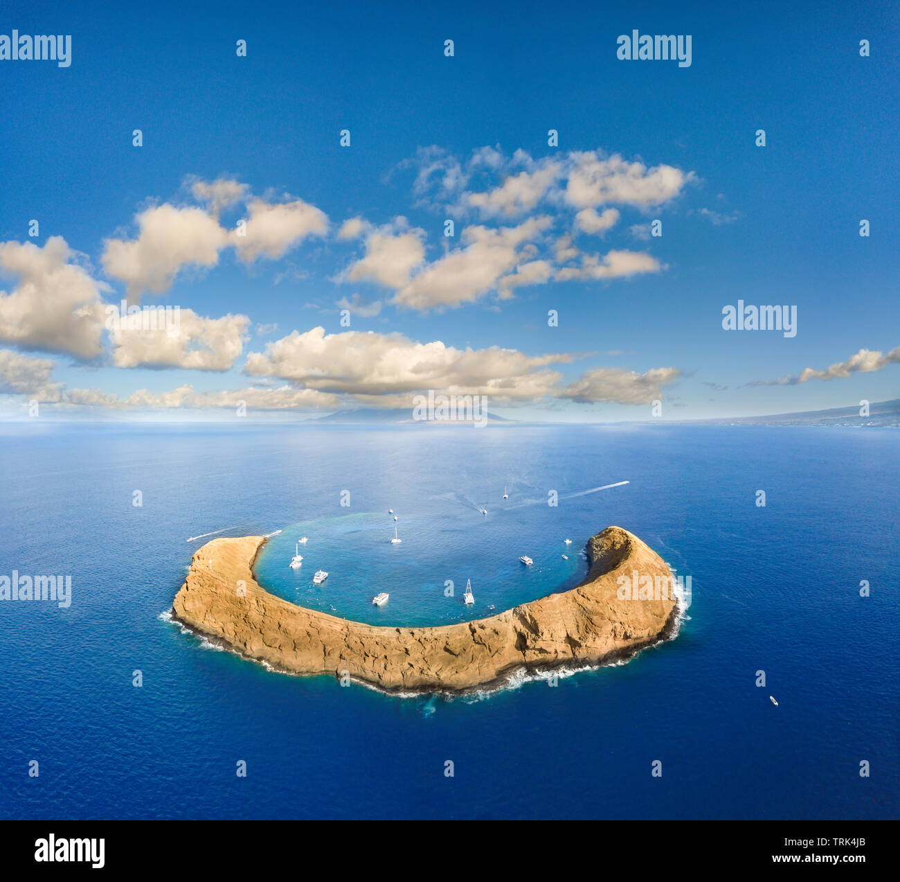 Molokini Crater, aerial shot of the crescent shaped islet at mid ...