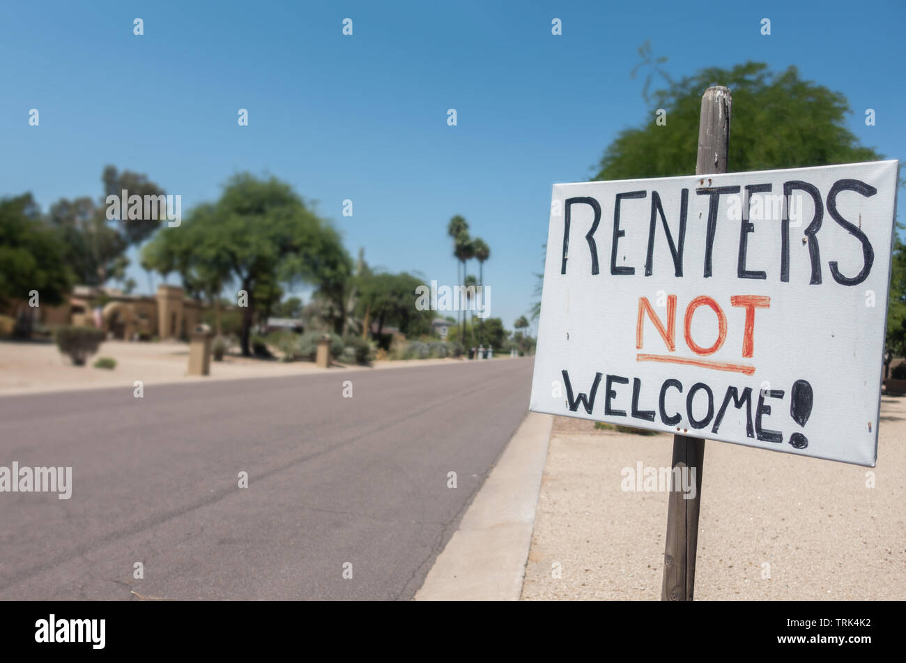 Renters Not Welcome Sign Concept Image on residential street. Unhappy ...