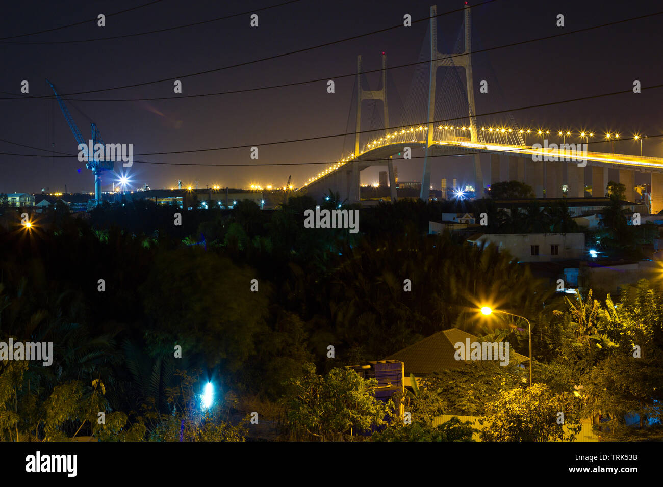 Saigon bridge at night Stock Photo - Alamy