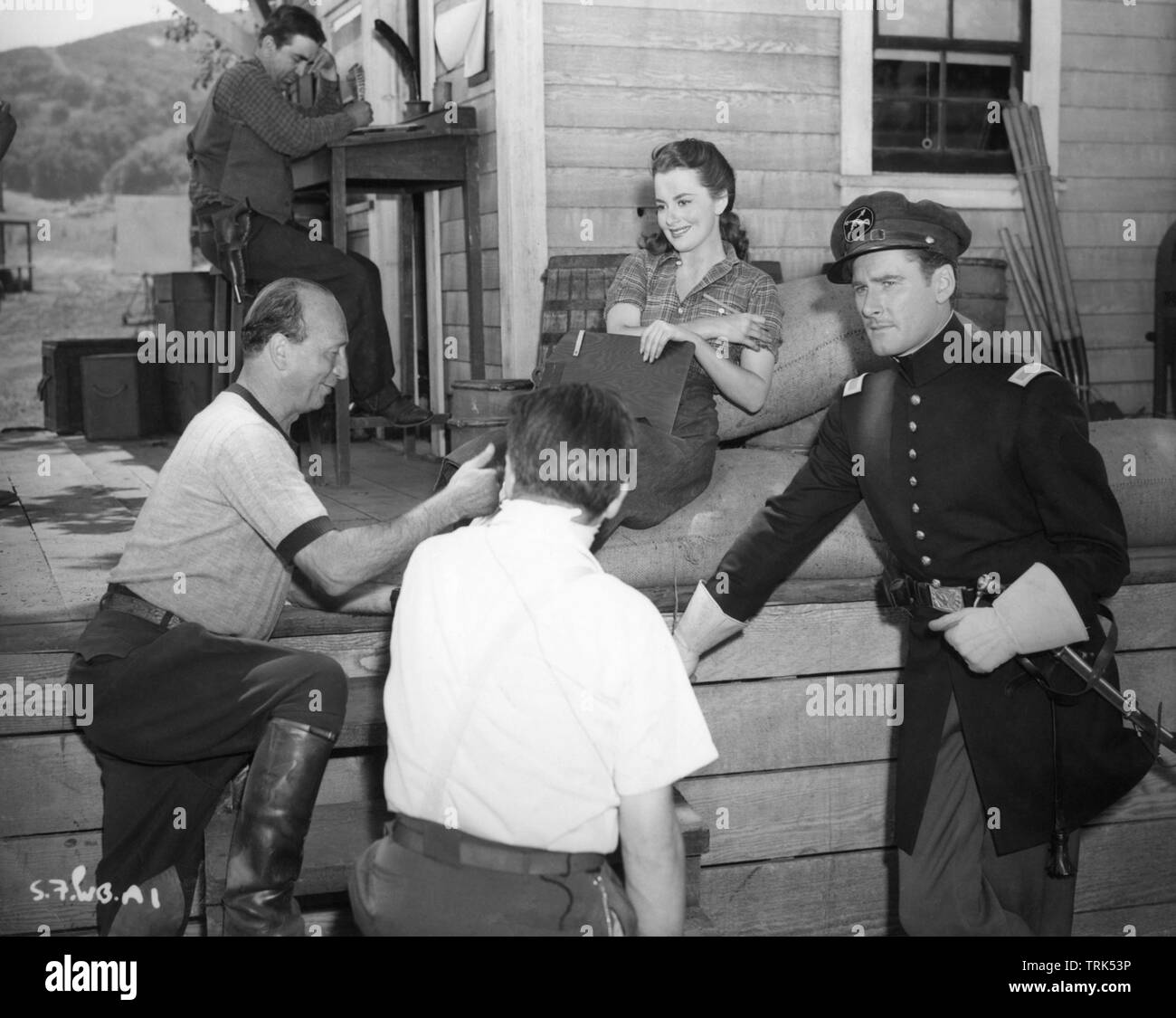 Director Michael Curtiz Olivia de Havilland and Errol Flynn as Jeb ...