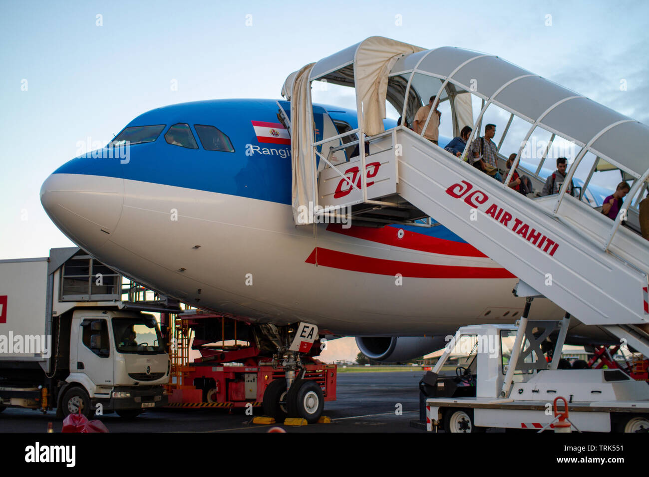 Getting off airplane after landing in Tahiti Stock Photo - Alamy