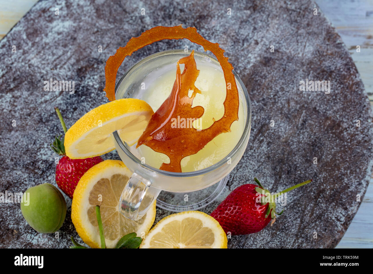 Lemonade with ice. Fresh lemonade with strawberry, mint shot top down ...