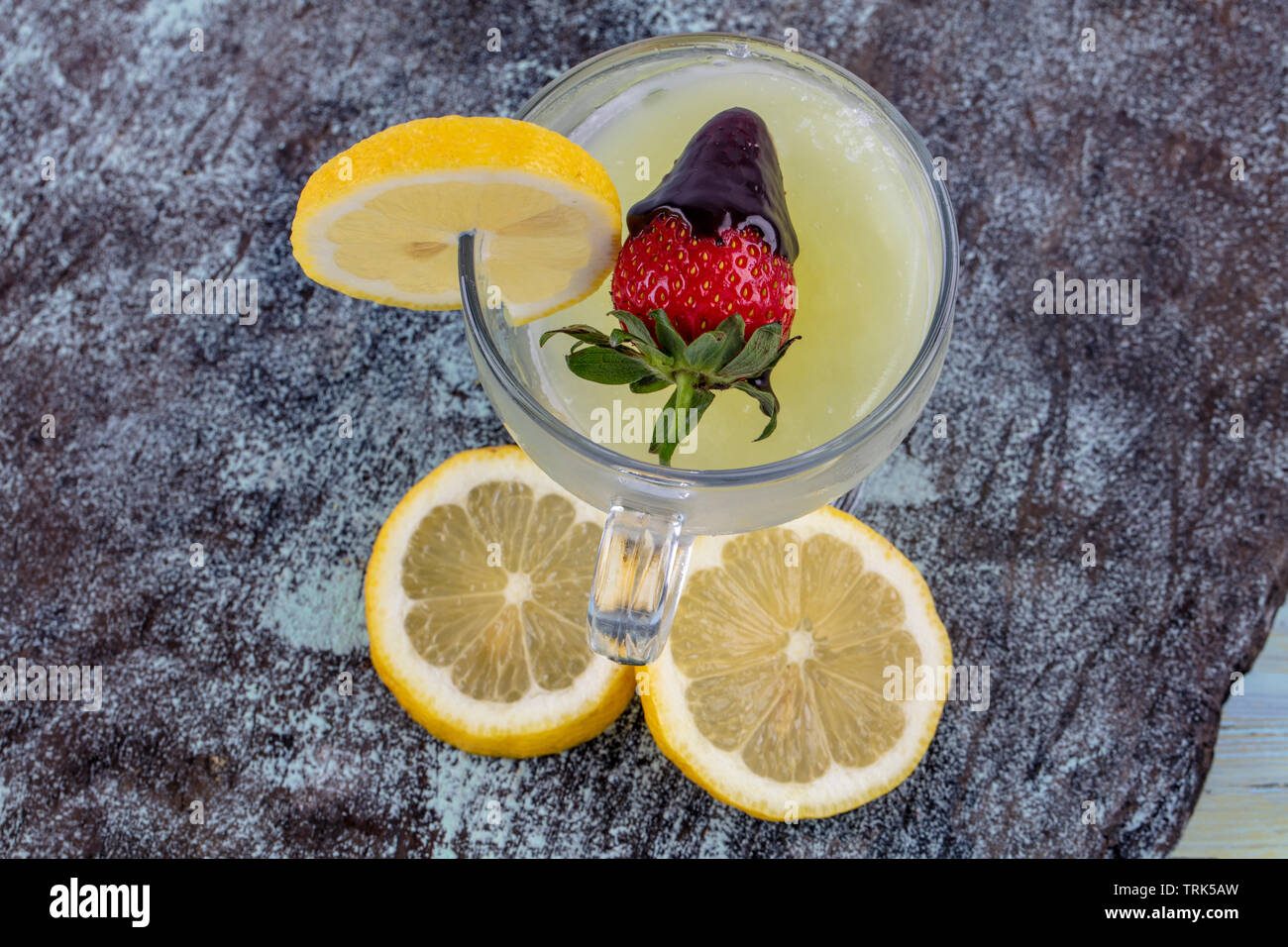 Lemonade with ice. Fresh lemonade with strawberry, mint shot top down ...