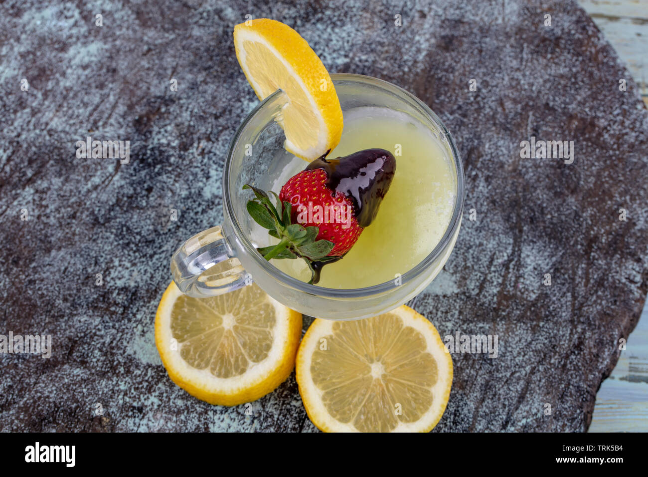 Lemonade with ice. Fresh lemonade with strawberry, mint shot top down ...