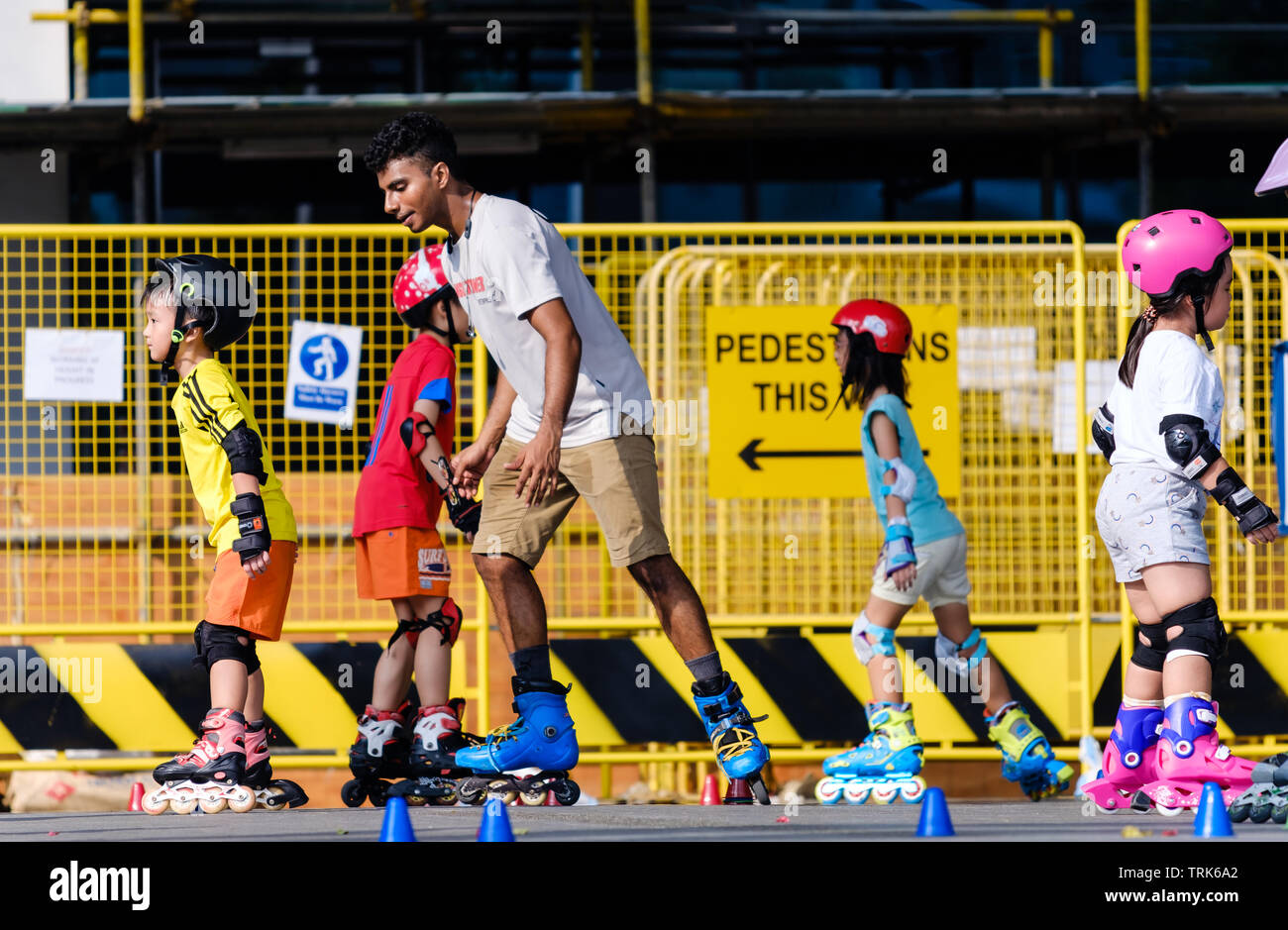 Singapore-23 MAR 2019：Roller skating class with senior teacher and ...