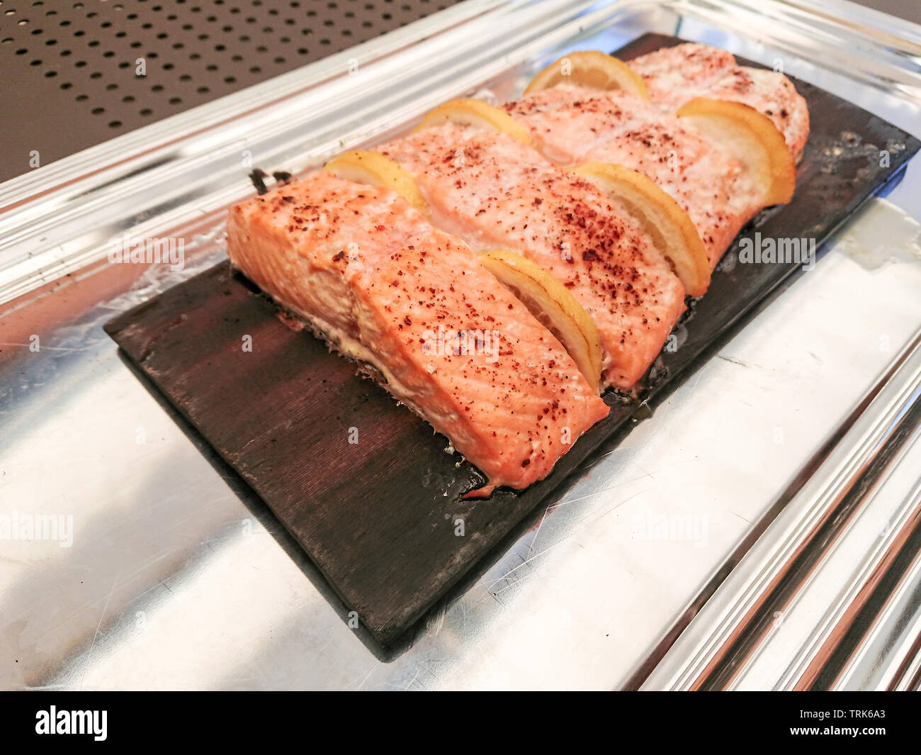Grilled whole salmon side fillet with lemon, top view Stock Photo - Alamy