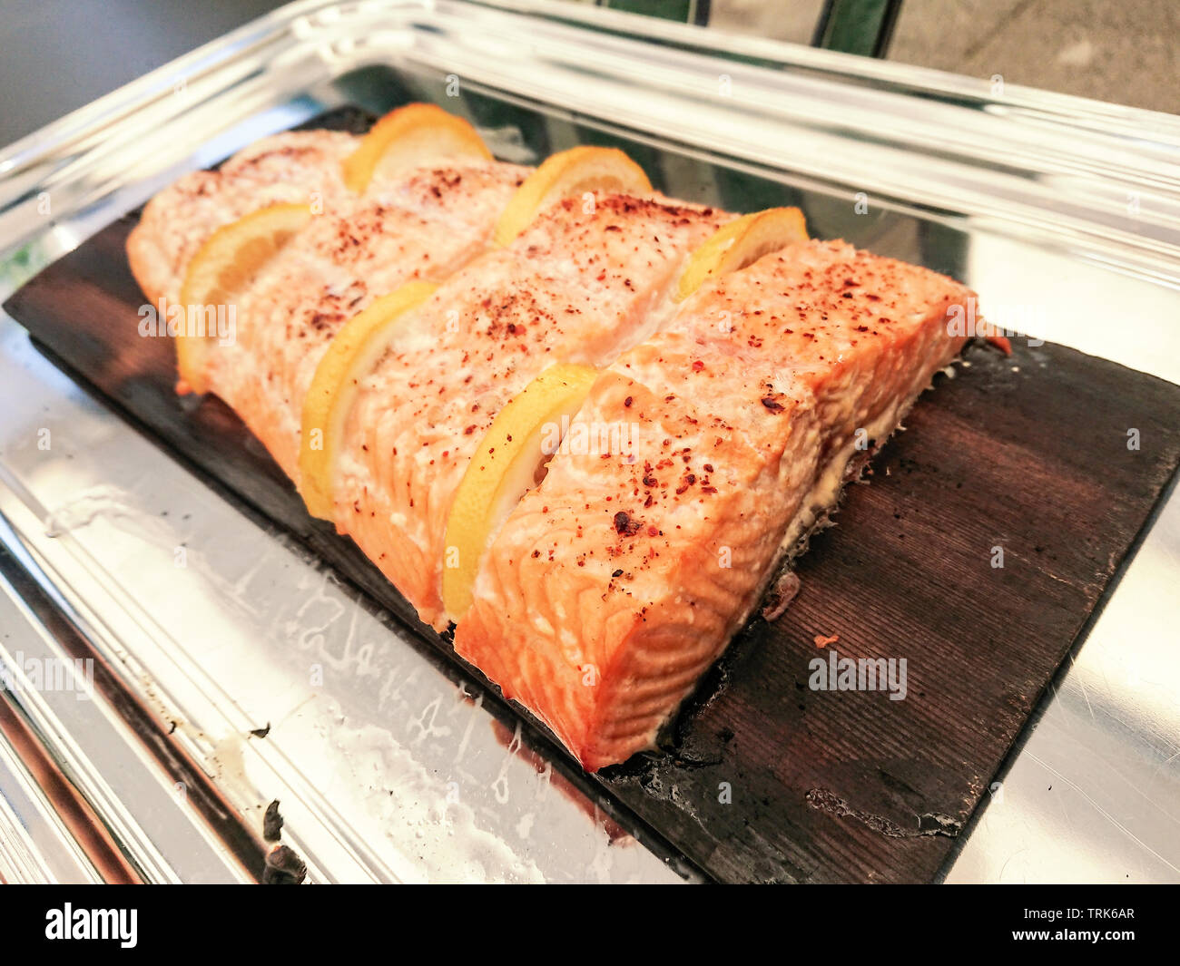 Grilled whole salmon side fillet with lemon, top view Stock Photo - Alamy