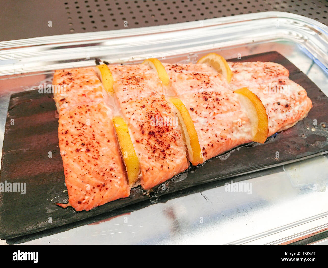 Grilled whole salmon side fillet with lemon, top view Stock Photo - Alamy