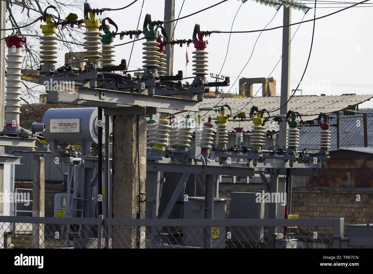 Close up of ceramic isolators on High voltage electricity ...