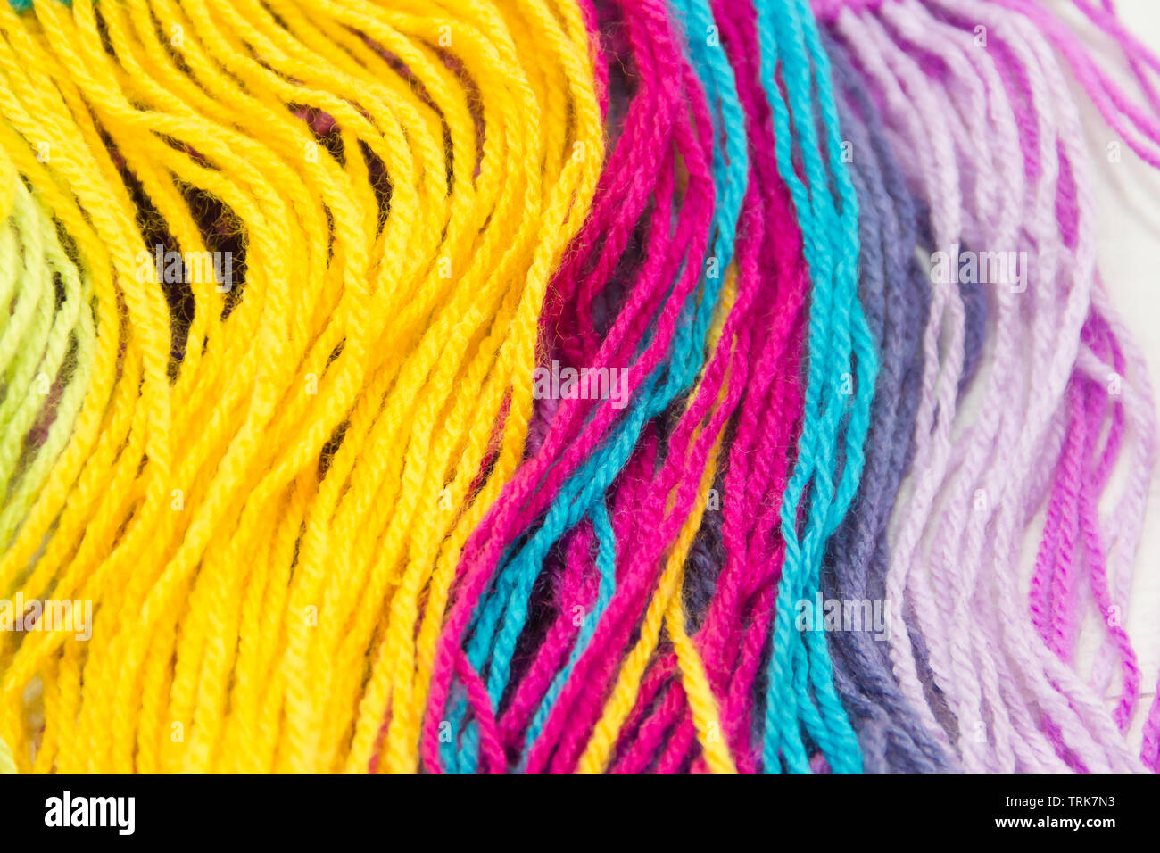 textured background of colorful woolen threads Stock Photo - Alamy