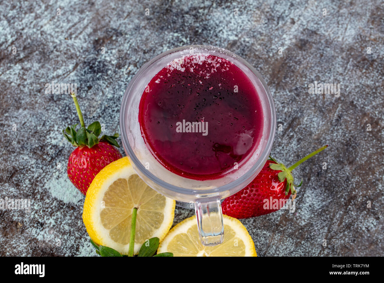 Lemonade with ice. Fresh lemonade with strawberry, mint shot top down ...