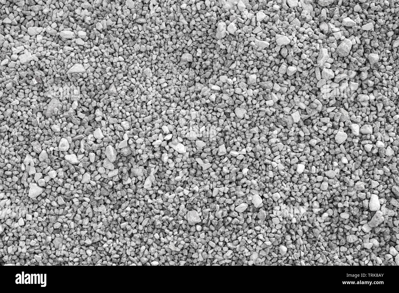 Gray industrial gravel covering the ground, background photo texture ...