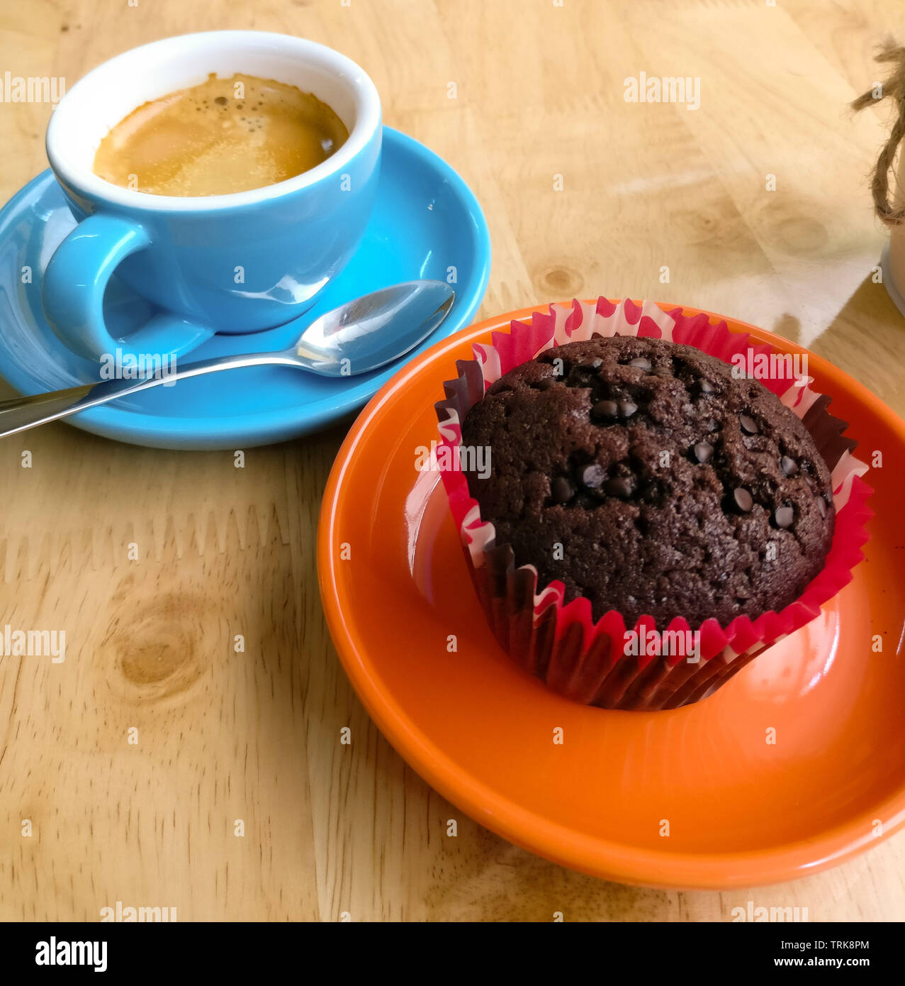 Espresso and chocolate muffin Stock Photo - Alamy