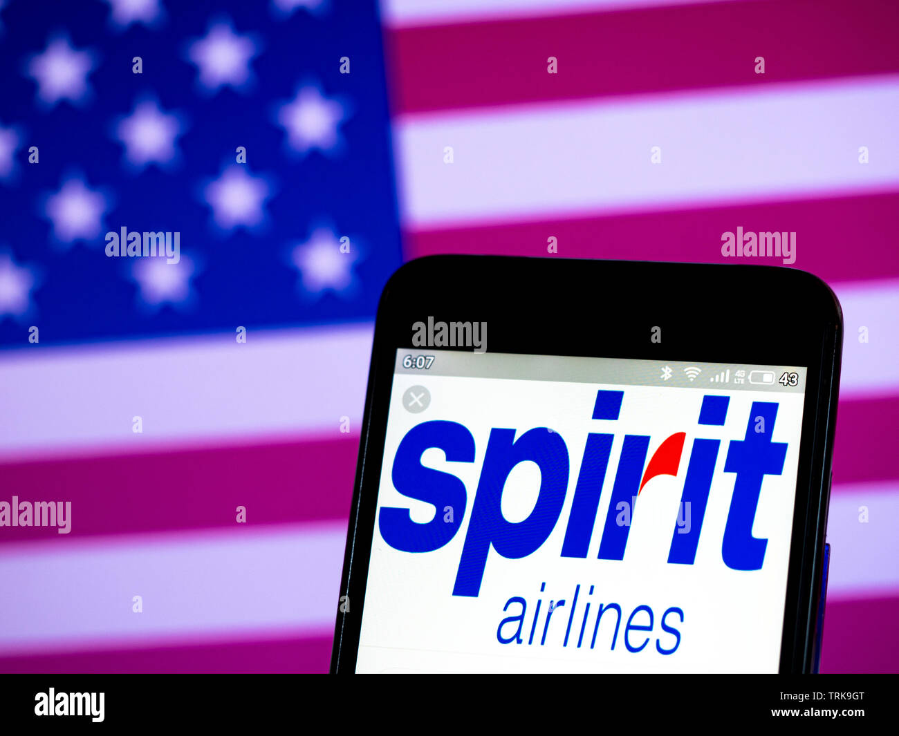 In this photo illustration the Spirit Airlines logo is seen displayed ...