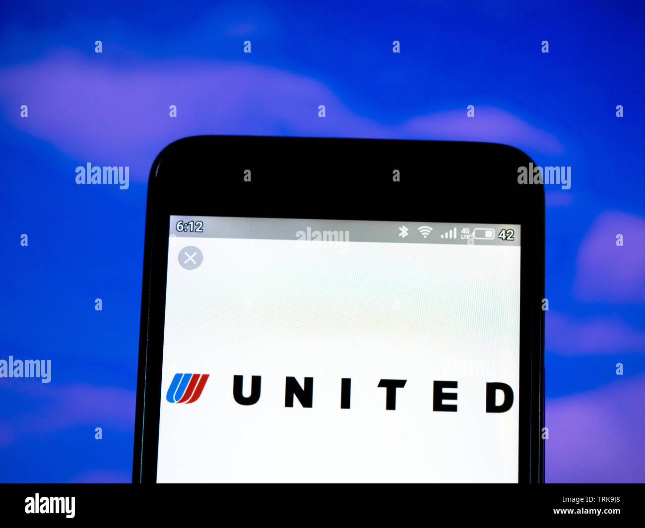 In this photo illustration the United Airlines logo is seen displayed ...