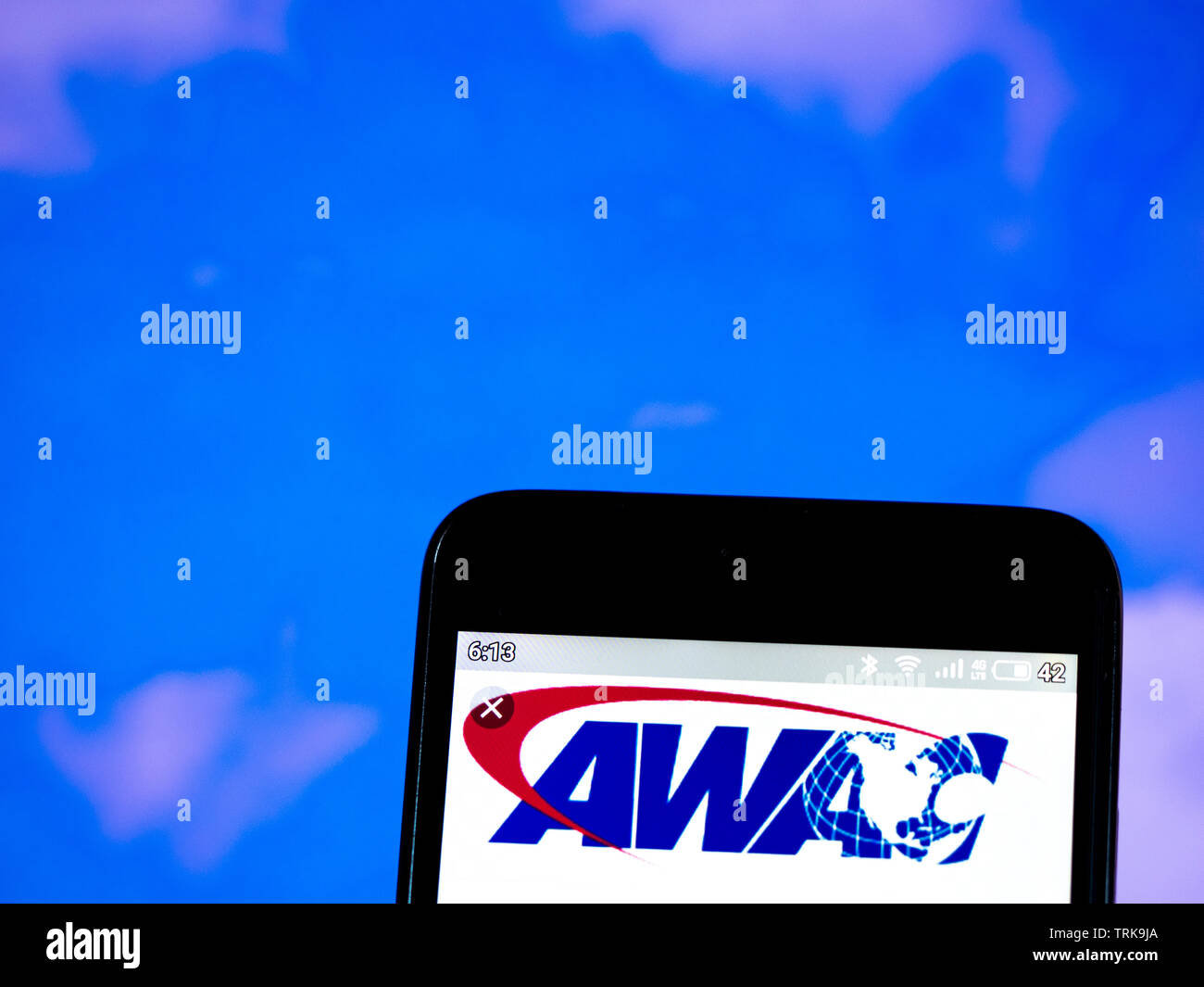 In this photo illustration the Air Wisconsin logo is seen displayed on ...