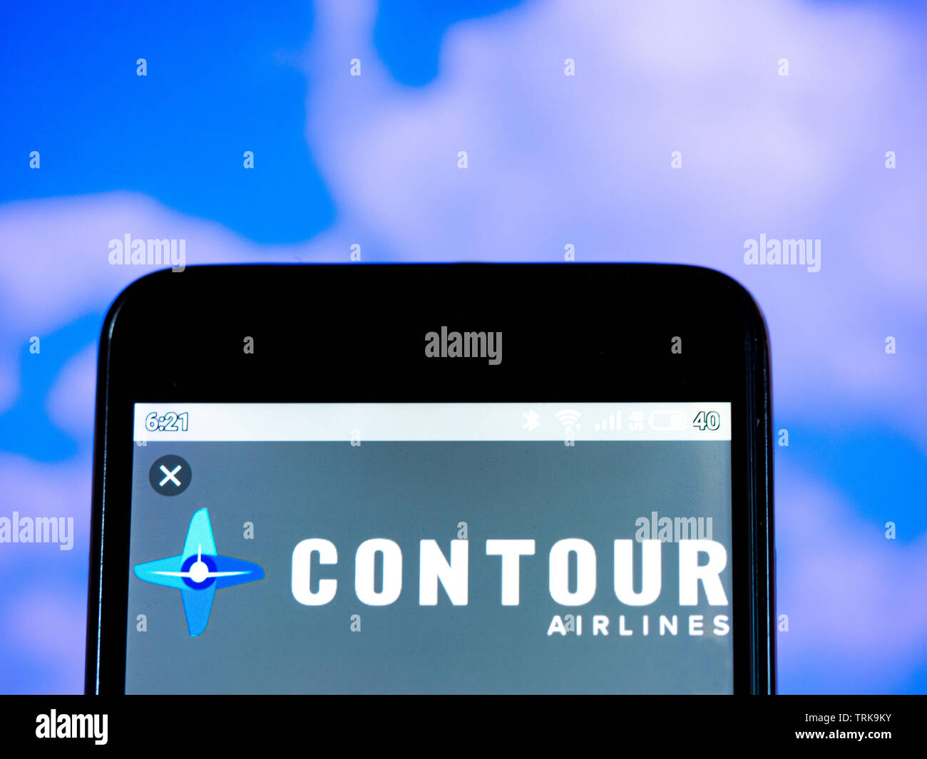 In this photo illustration the Contour Airlines logo is seen displayed ...