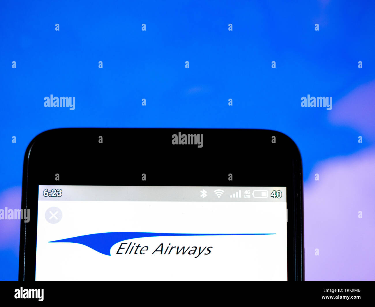 In this photo illustration the Elite Airways logo is seen displayed on ...