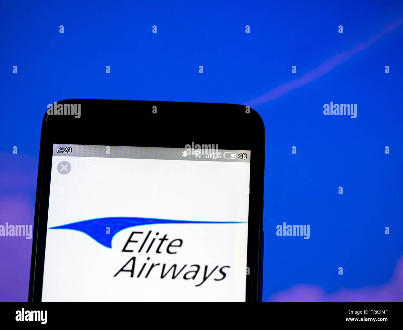 In this photo illustration the Elite Airways logo is seen displayed on ...