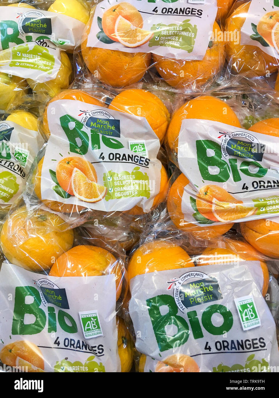 Organic oranges packaged in plastic blister packs, France Stock Photo ...