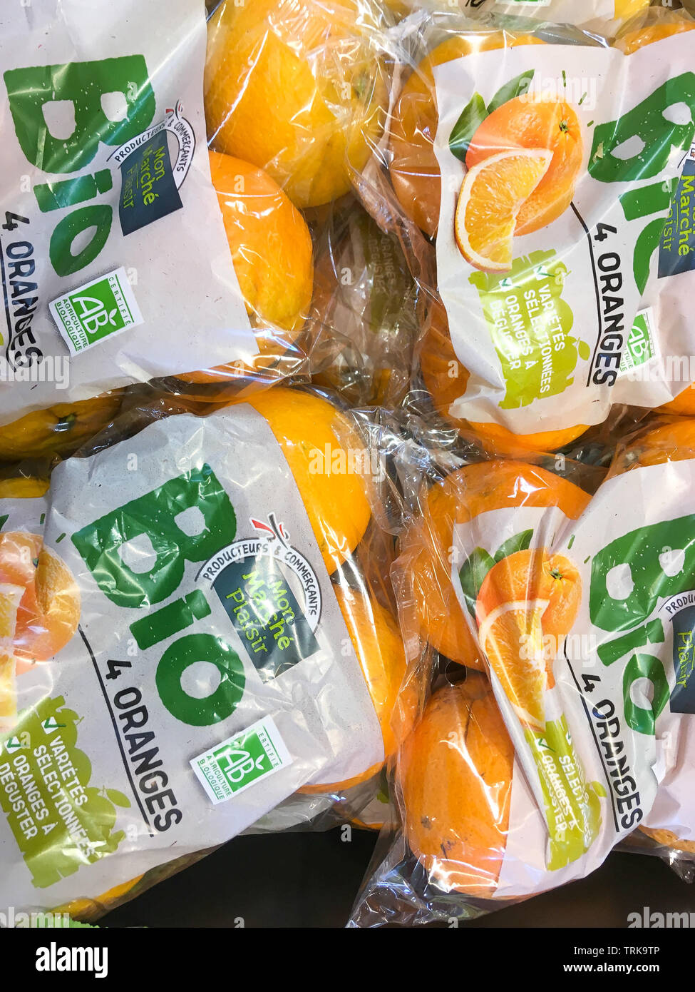 Organic oranges packaged in plastic blister packs, France Stock Photo ...