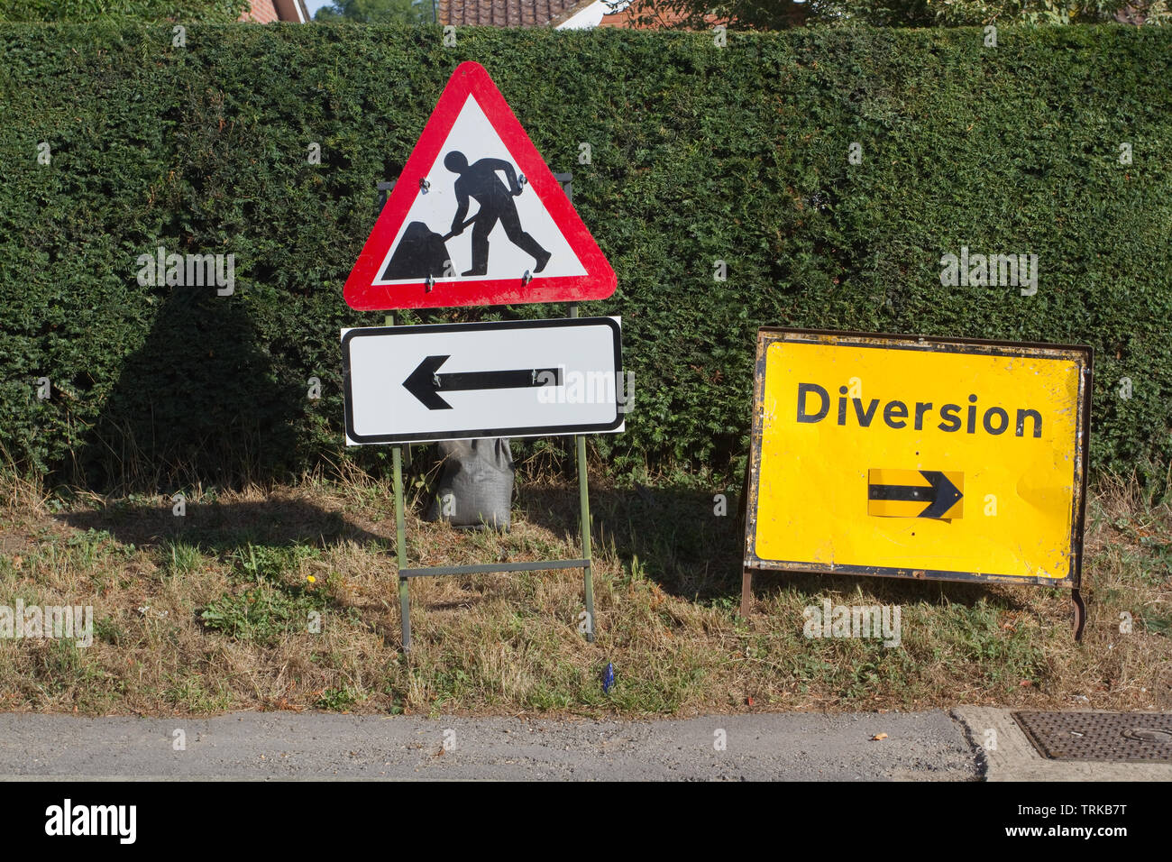 Contradictory road signs hi-res stock photography and images - Alamy