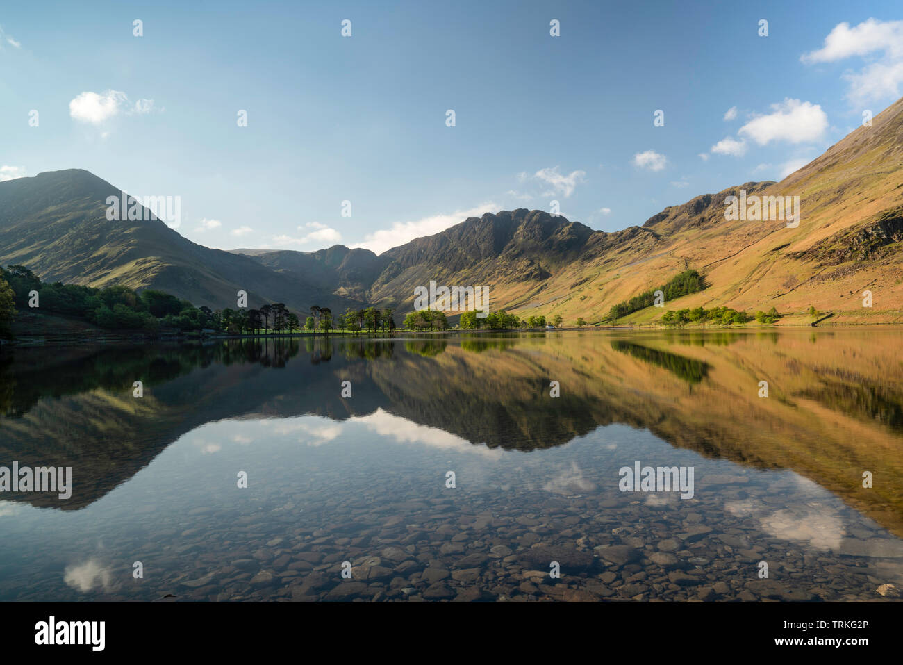 Early morning reflections of Fleetwith Pike, Haystacks and the famous ...