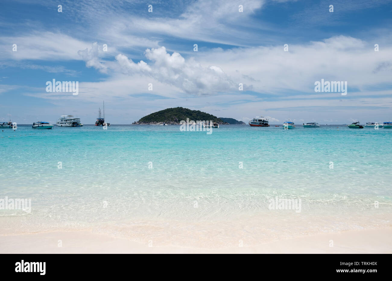 Beautiful clear sea with boat in similan island Stock Photo - Alamy
