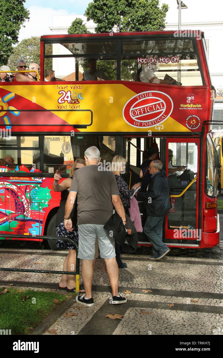 Tourist tour bus in the capital of Funchal on the island of Madeira ...