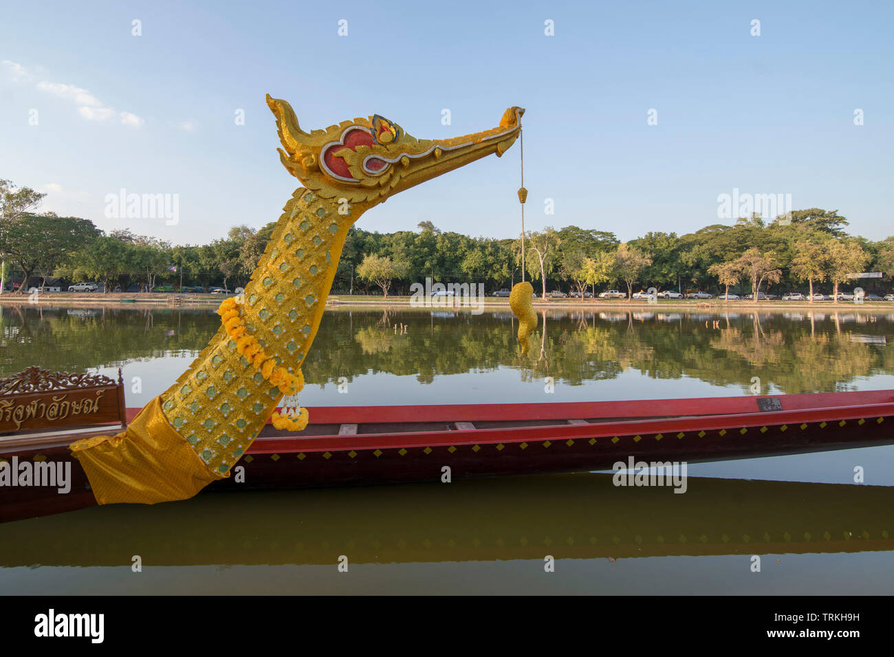 a dragon longboat at the lake at the Historical Park in Sukhothai in ...