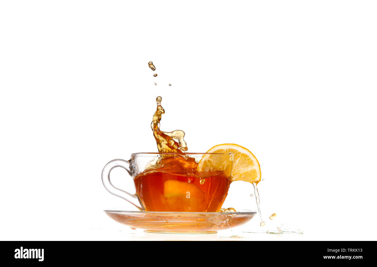 lemon tea with a splash on a white background Stock Photo - Alamy