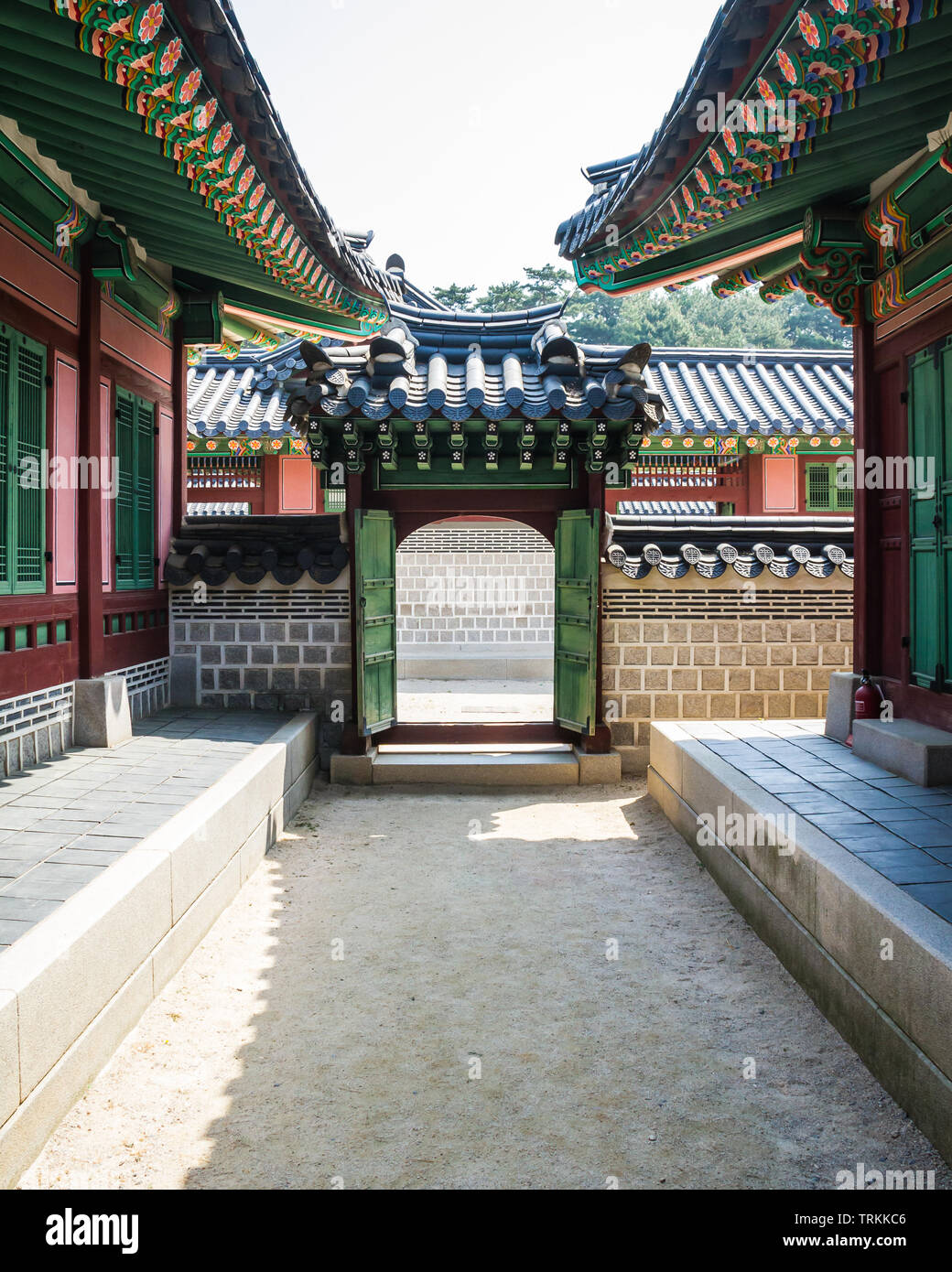 A traditional Korean Gate with open green doors Stock Photo - Alamy