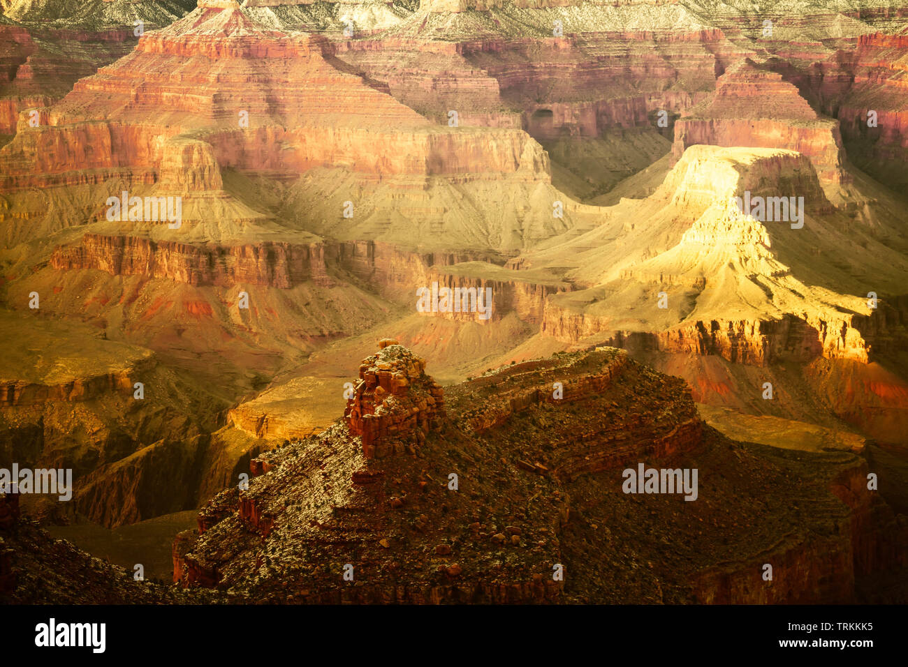 The colors of the many layers of the rock that forms the walls of the ...