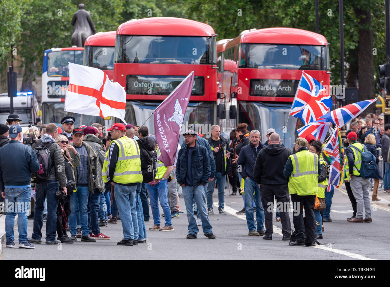 Yellow Vest protesters stood in front of traffic in Whitehall, London ...