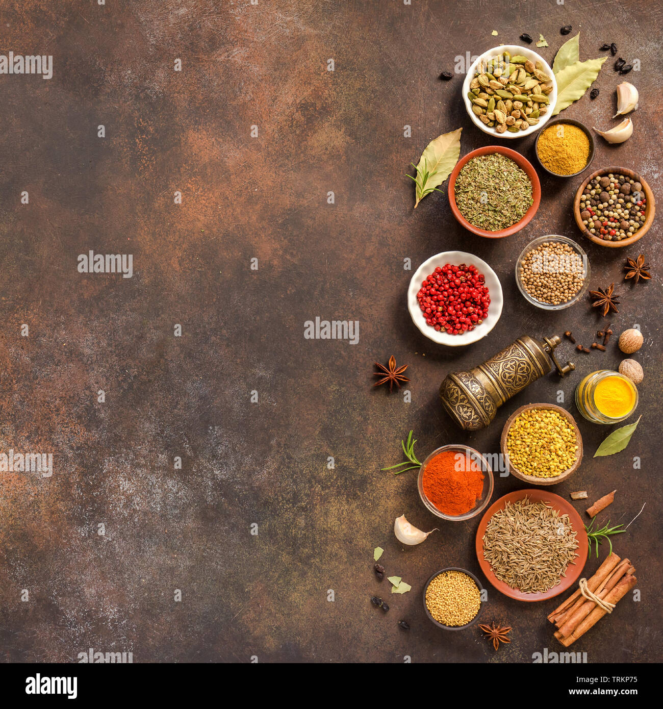 Various Spices on dark wooden background. Assortment, set of spices and ...