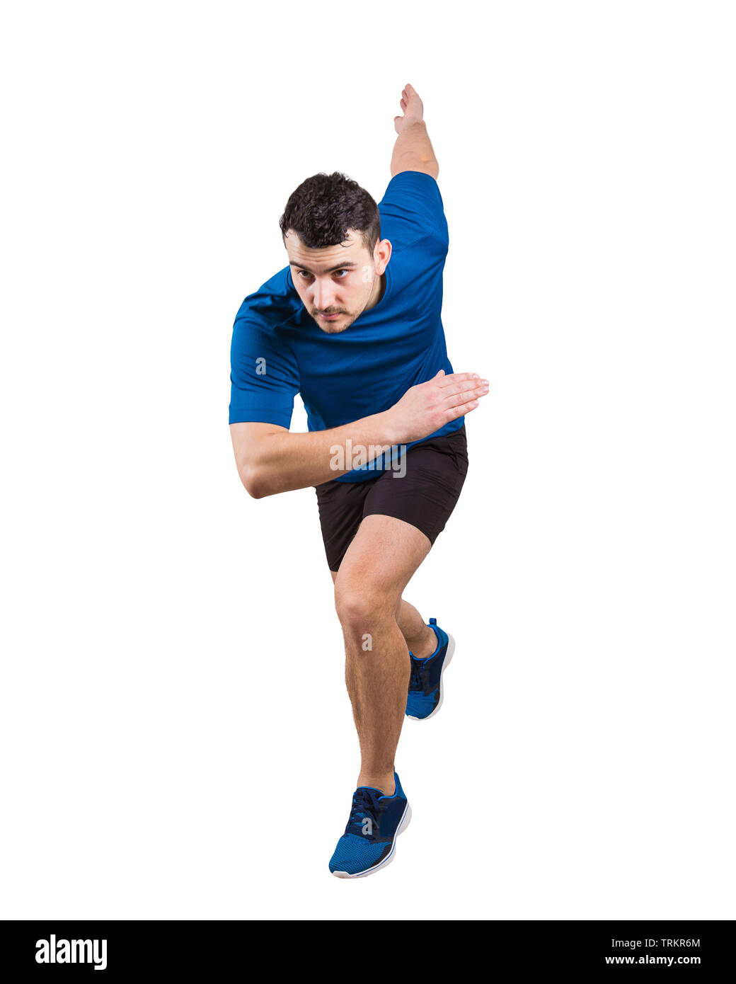 Determined caucasian man runner standing in running position looking ...