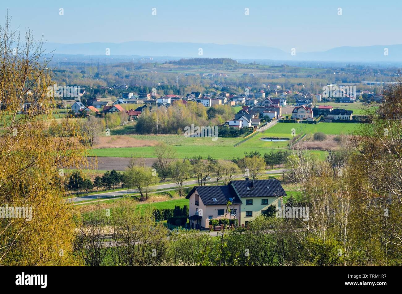 Spring urban landscape. Houses in the countryside in Poland Stock Photo ...