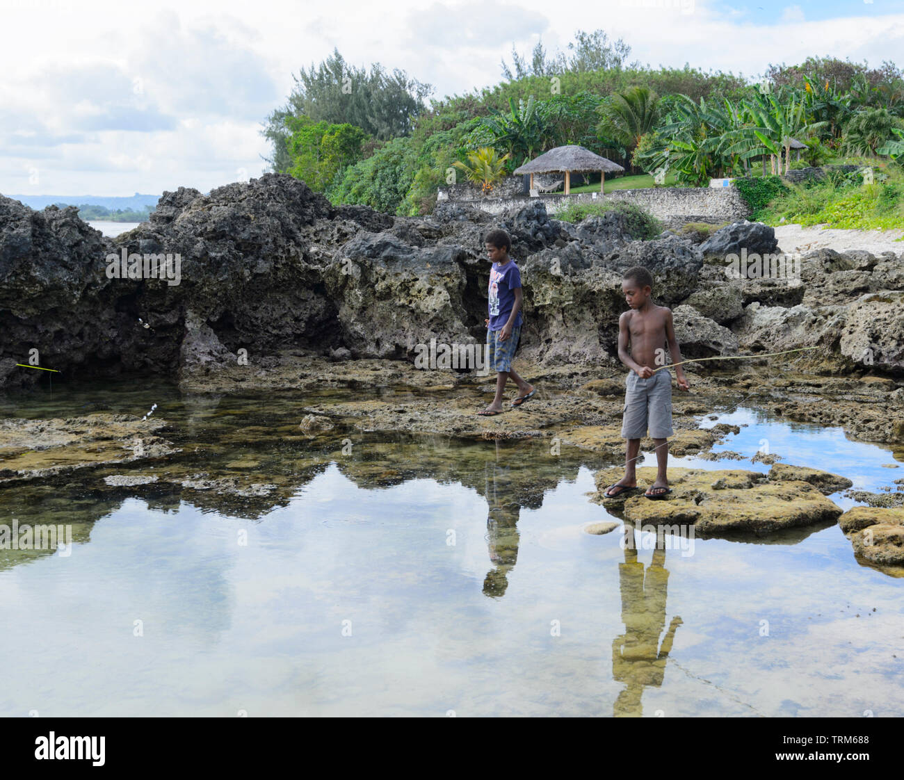 Vanuatu children fishing hi-res stock photography and images - Alamy