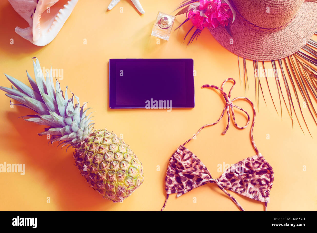 Summer background with a tablet - top view Stock Photo - Alamy