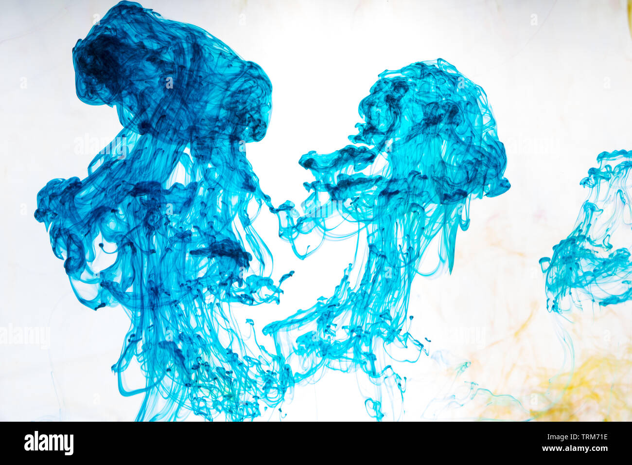 Acrylic colors and ink in water. Abstract background Stock Photo - Alamy