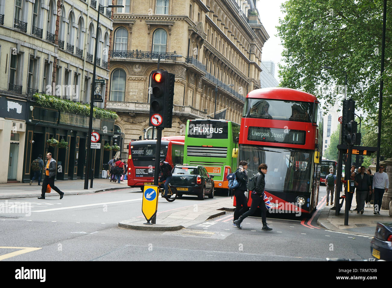 A Flixbus and public bus on Buckingham palace road SW1, London, England ...