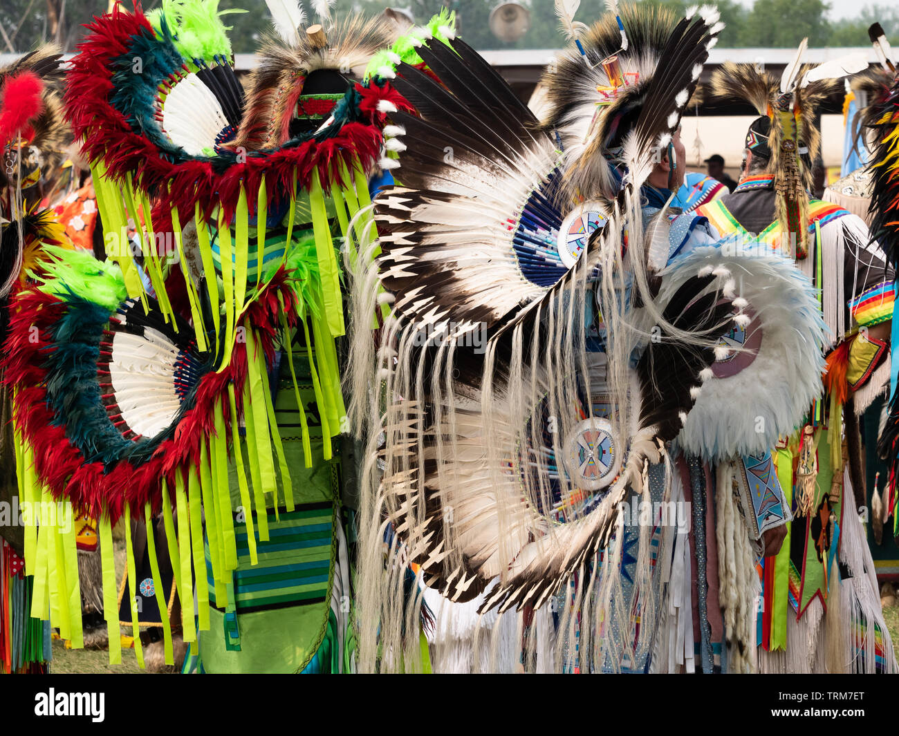 Two Native American fancy dancers waiting to dance at a pow wow at Crow ...